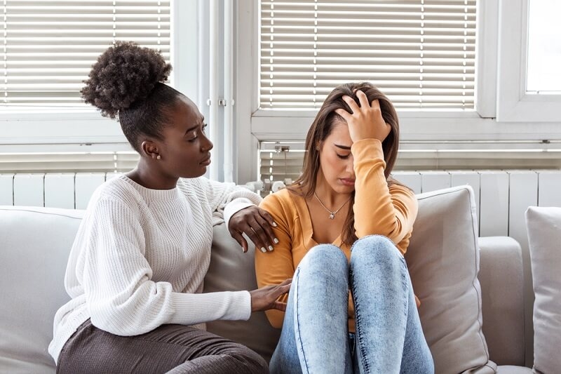 Tips To Help A Friend Through A Breakup: Guiding Heartache